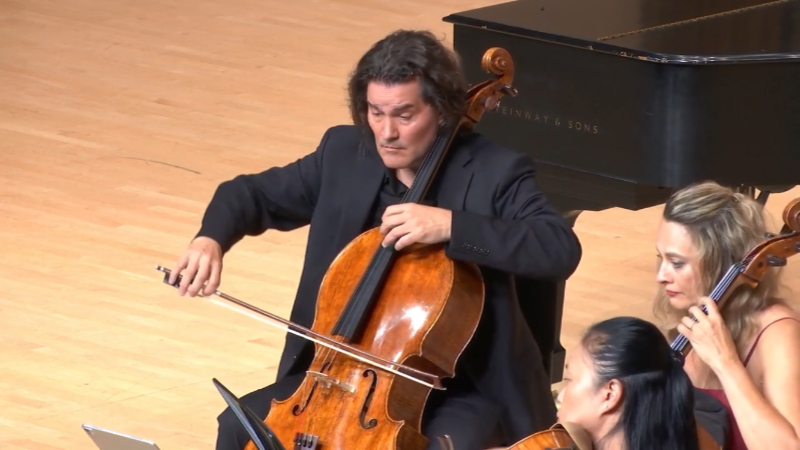Cellist Zuill Bailey (center) plays the solo part in Schubert's ...