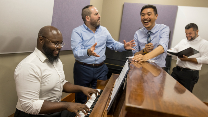 Composer George Tsz-Kwan Lam and librettist David Davila work with ...